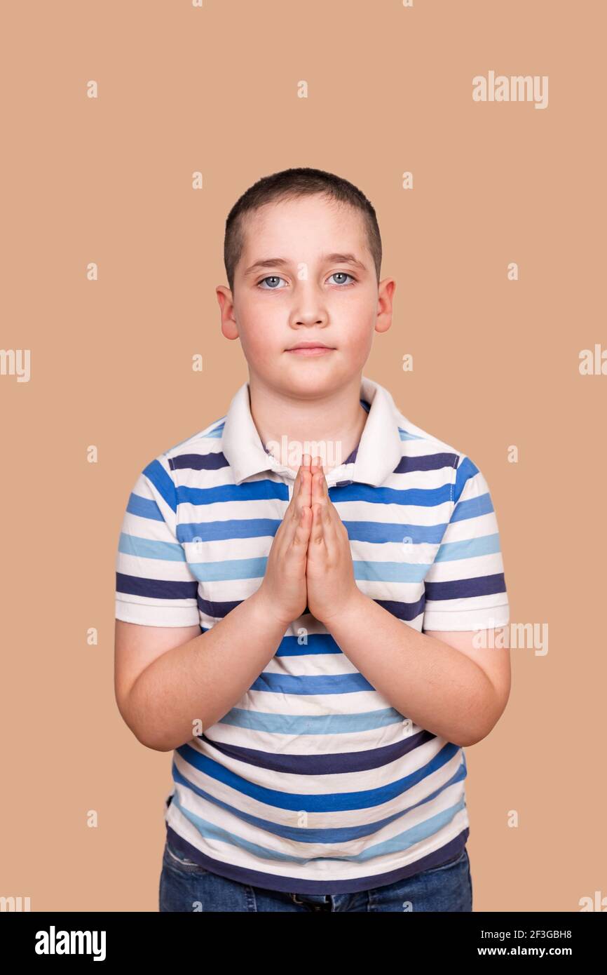 Little boy praying in the morning. Portrait of kid hand praying Stock ...
