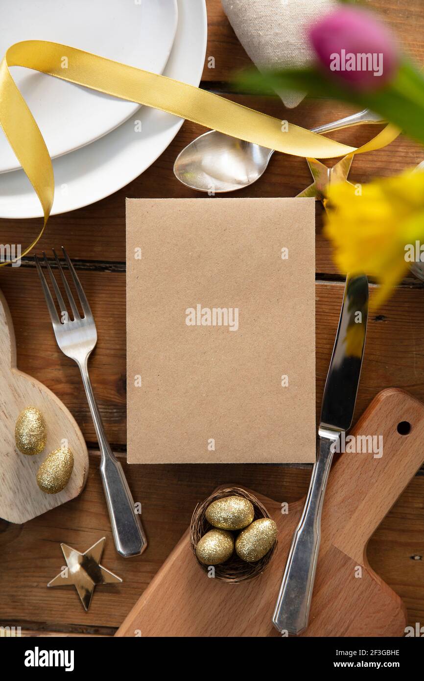 Happy easter celebration background. Decorated table with blank menu ...