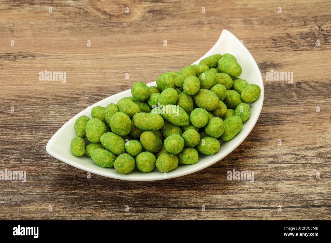 Spicy wasabi peanuts snack in the bowl Stock Photo - Alamy