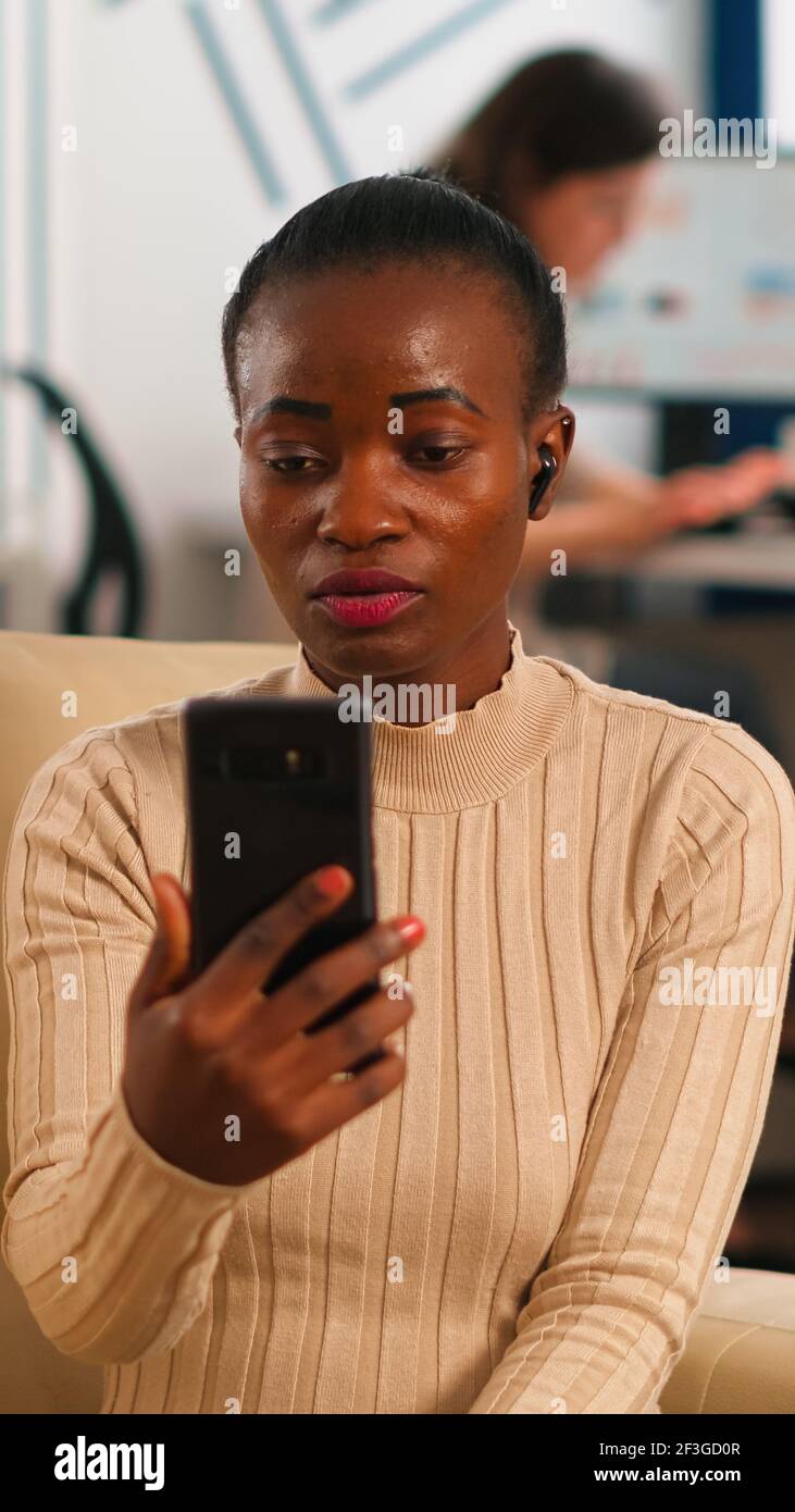 African manager woman discussing with remote colleagues on video call ...