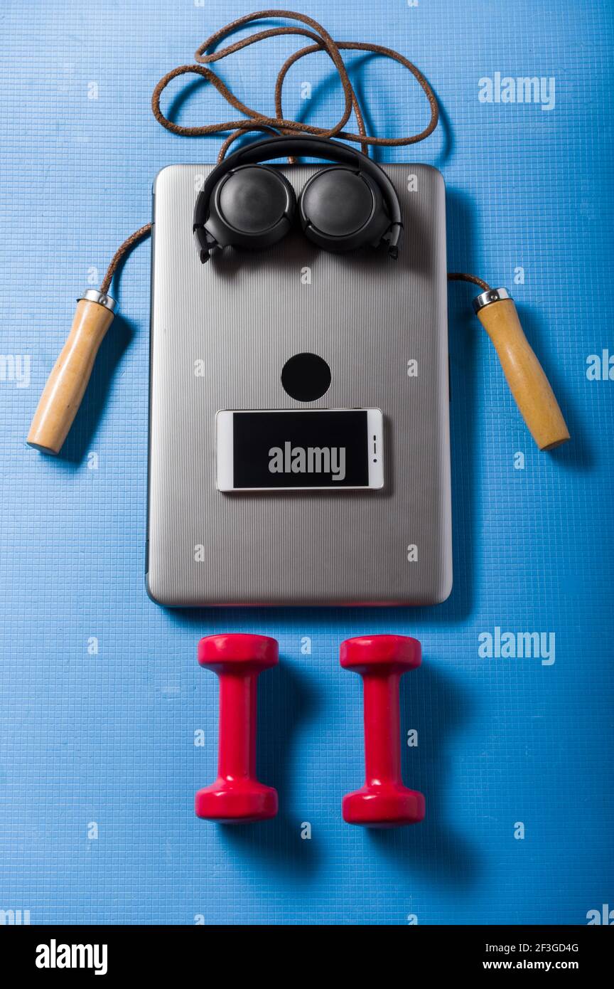 A robot doing fitness exercises on a fitness mat. Visualization of ...