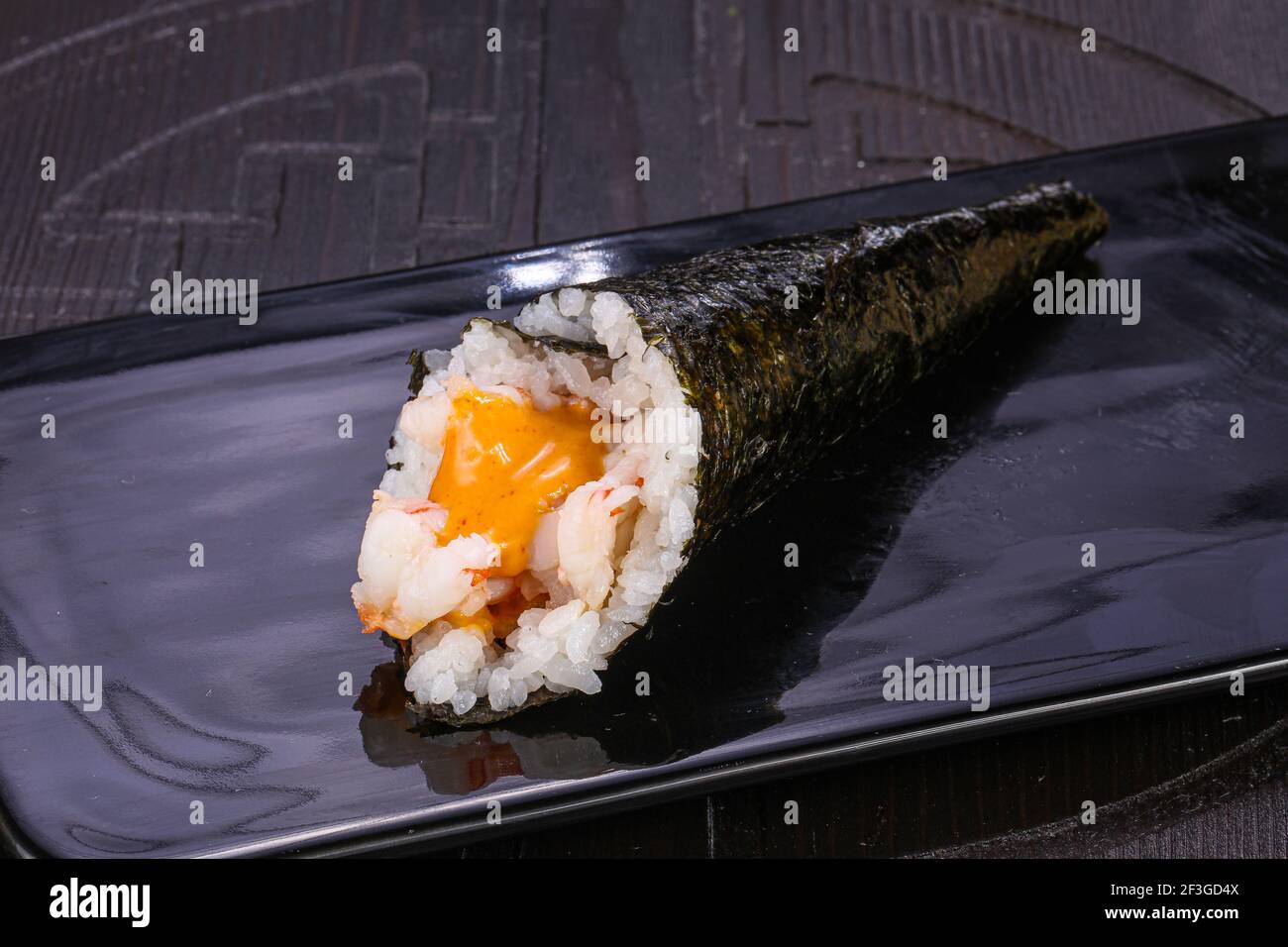 Japanese cuisine - Temaki with eel or handroll Stock Photo - Alamy