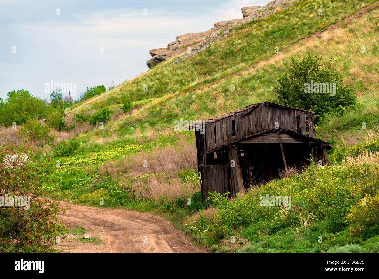 Abandoned and ruined wooden rustic barn in village Stock Photo - Alamy