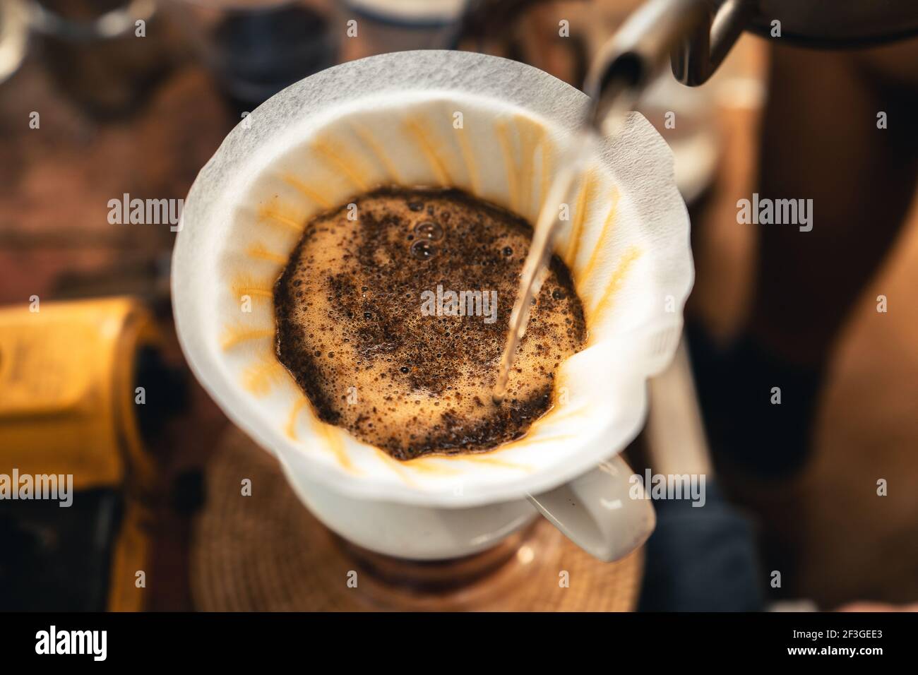 Pour hot water over the coffee Stock Photo - Alamy