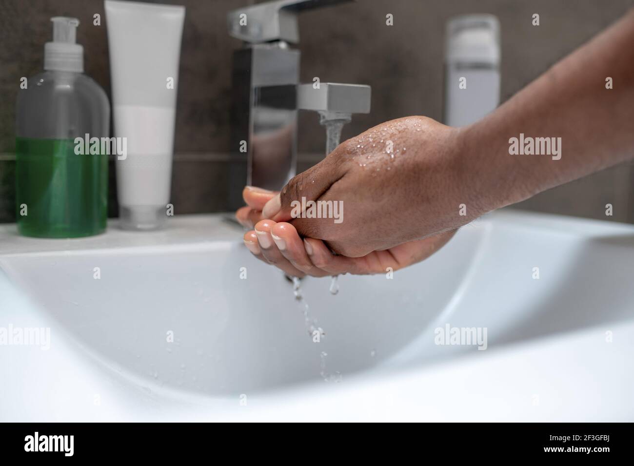 Close up picture of mans hands and a water basin Stock Photo - Alamy