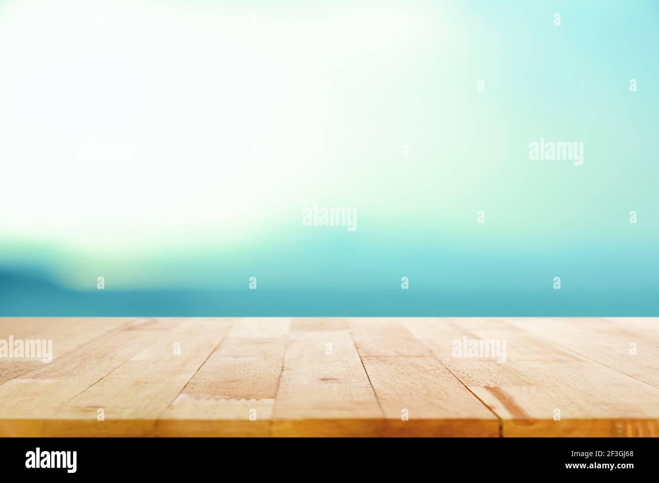 Wood table top on white blue gradient background - can be used for ...