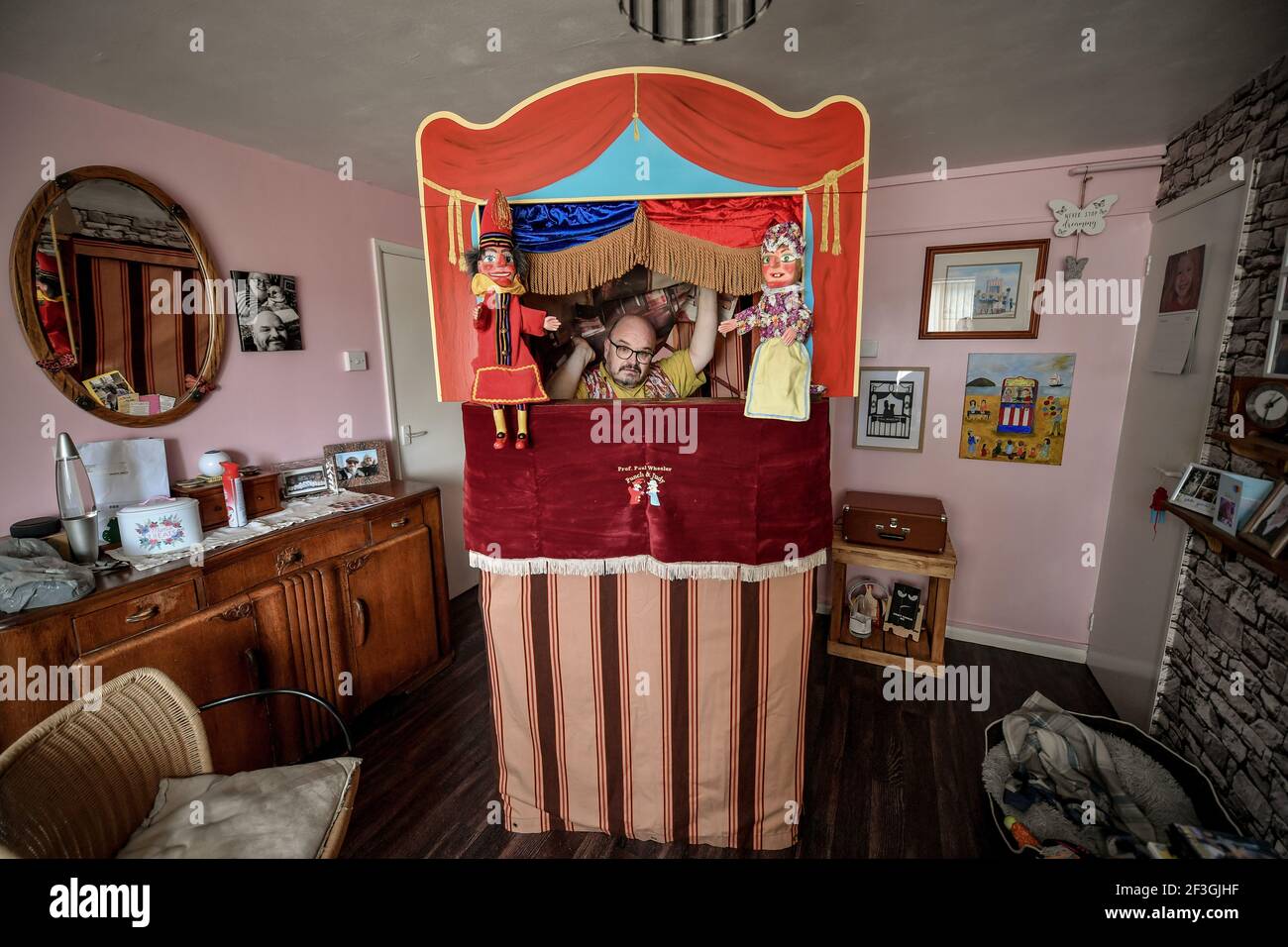 Professor Paul Wheeler inside his Punch & Judy booth with the main ...