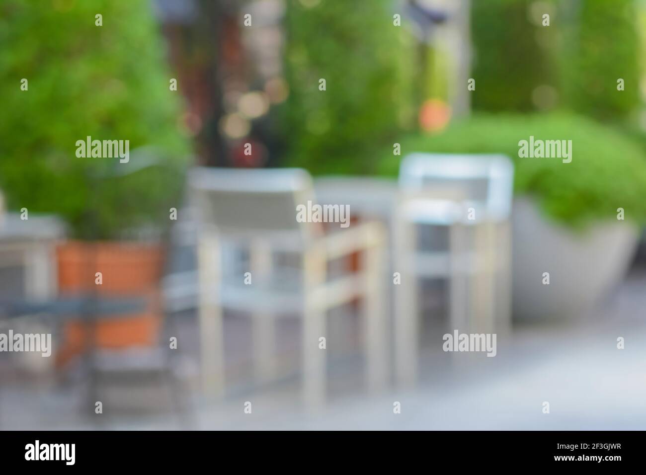 Blurred abstract background of outdoor cafe in the garden Stock Photo ...