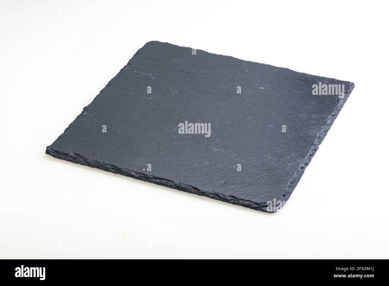 Black stone board isolated on white background Stock Photo - Alamy