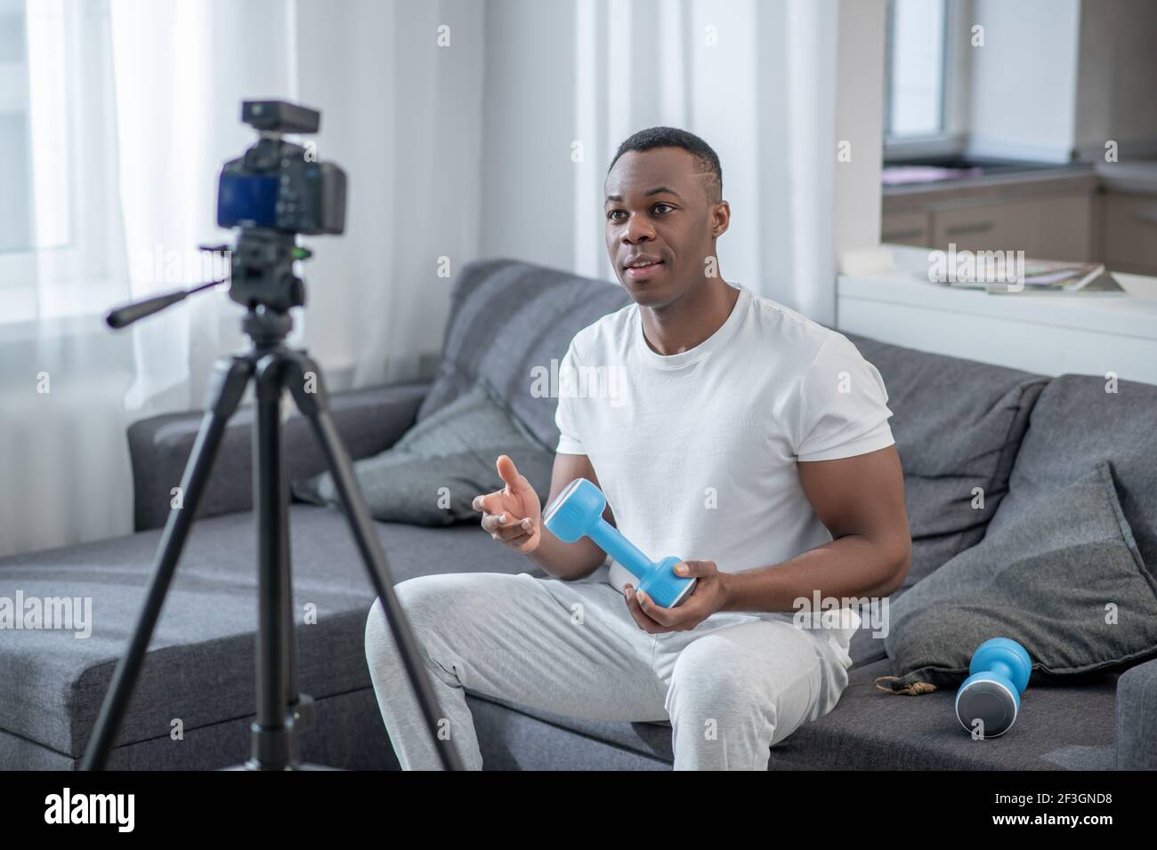 African american young man having an online tutorial Stock Photo - Alamy