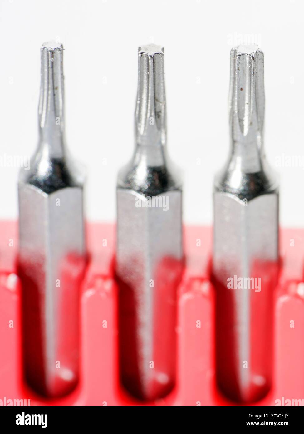 Screwdriver bits made from tool steel in the red box photographed ...