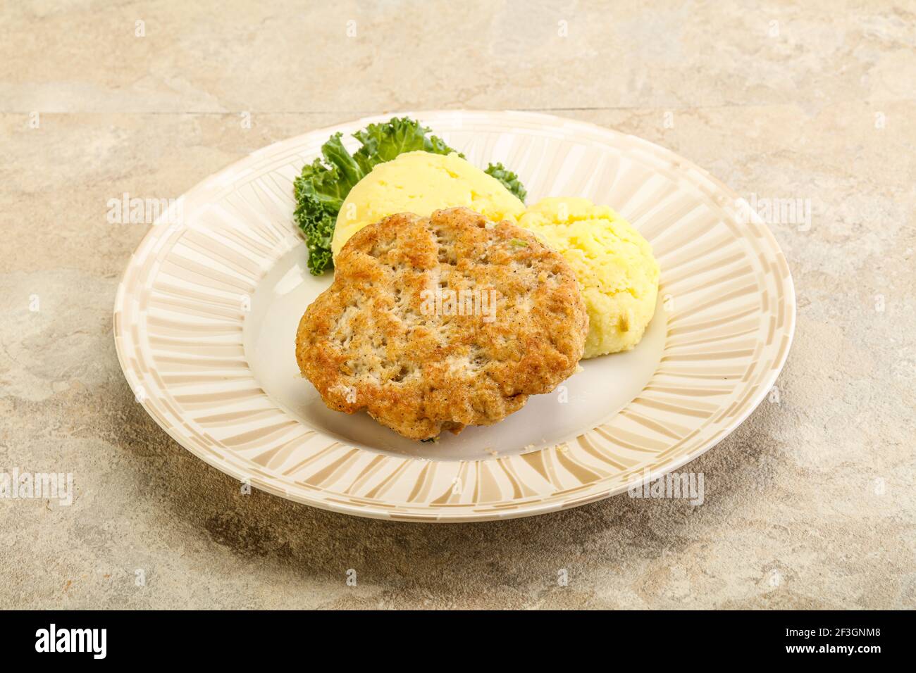 Minced Chicken cutlet with mashed potato Stock Photo - Alamy