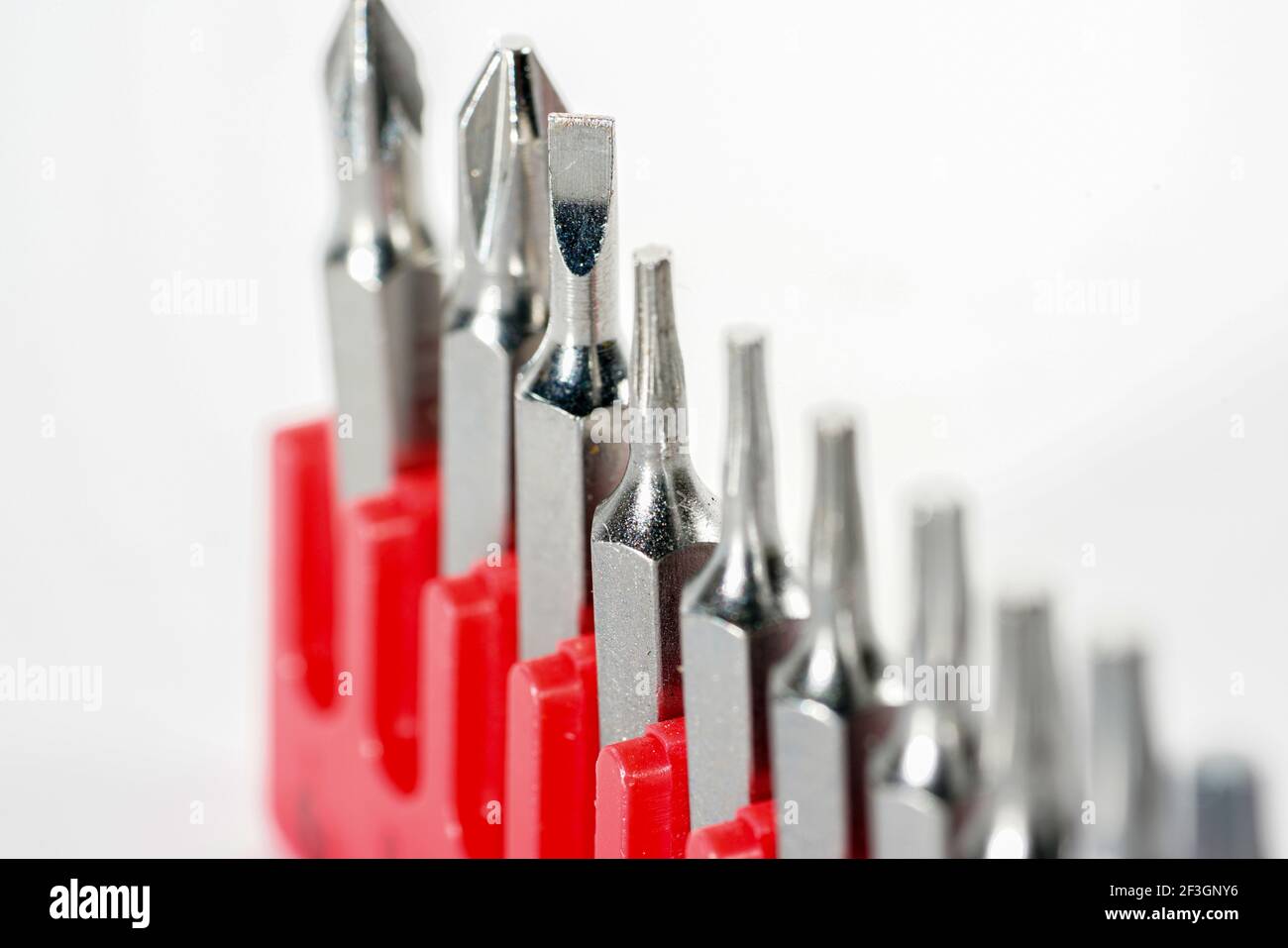 Screwdriver bits made from tool steel in the red box photographed ...
