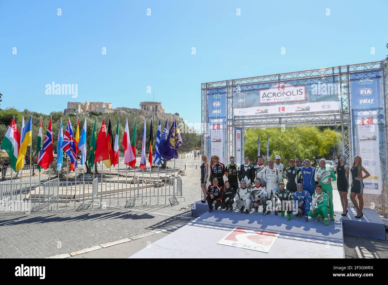 Drivers and Codrivers on the podium start with the Parthenon during the ...