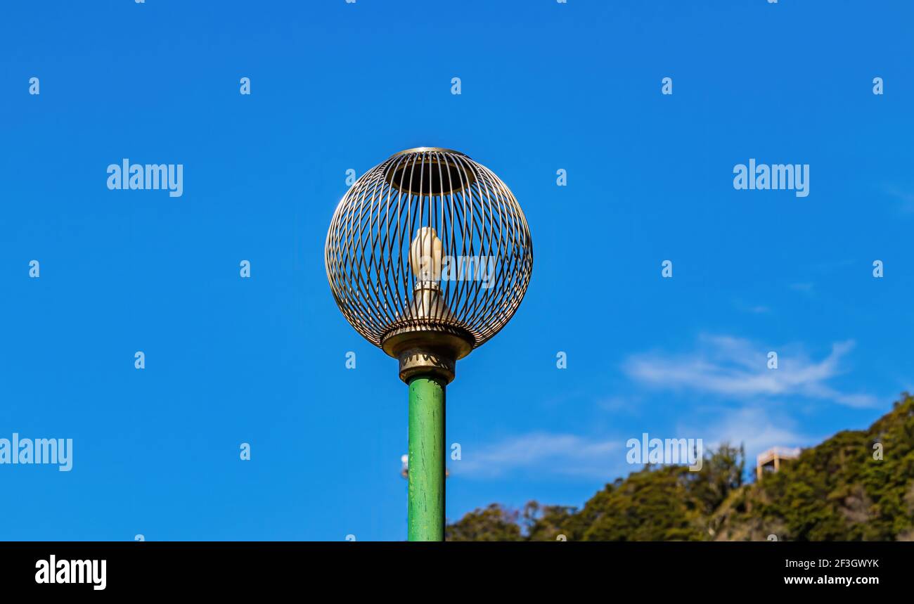 Futuristic top of a lamppost, against the backdrop of a blue sky with a ...