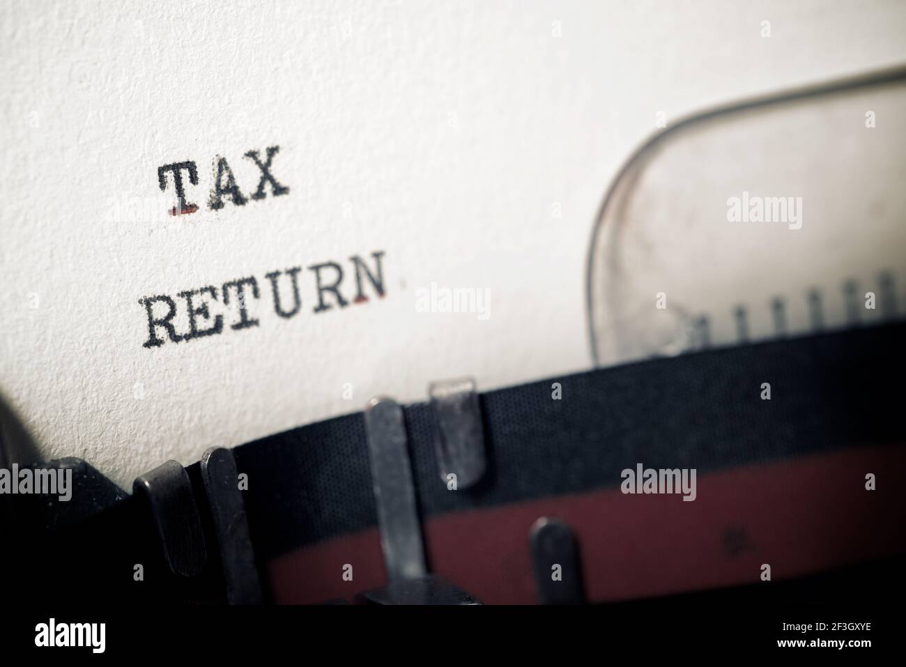 Tax return phrase written with a typewriter Stock Photo - Alamy