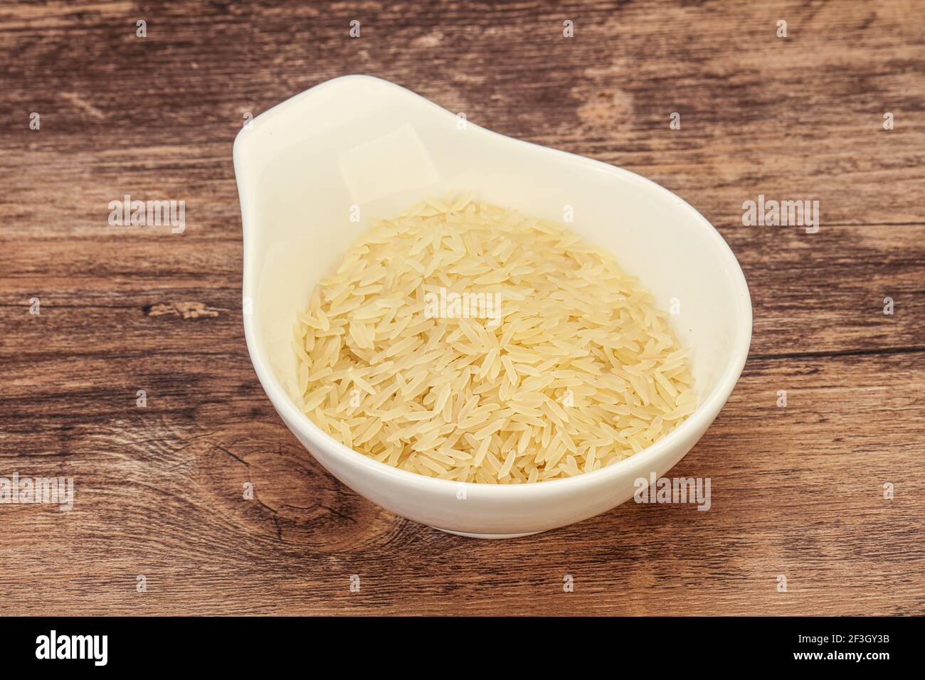 Raw Indian basmati rice in the bowl Stock Photo - Alamy