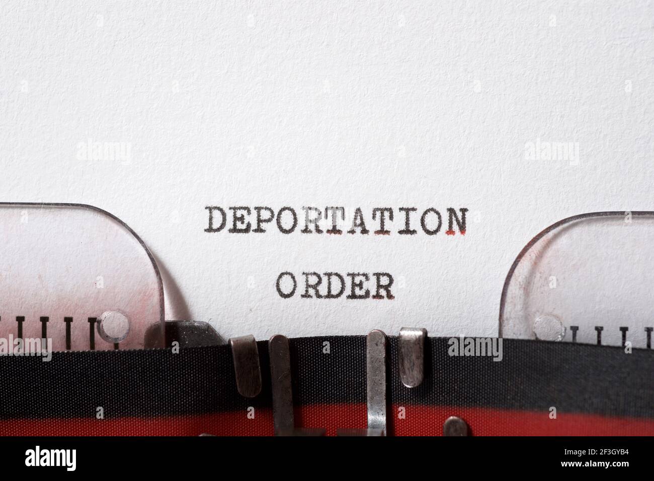Deportation order phrase written with a typewriter Stock Photo - Alamy