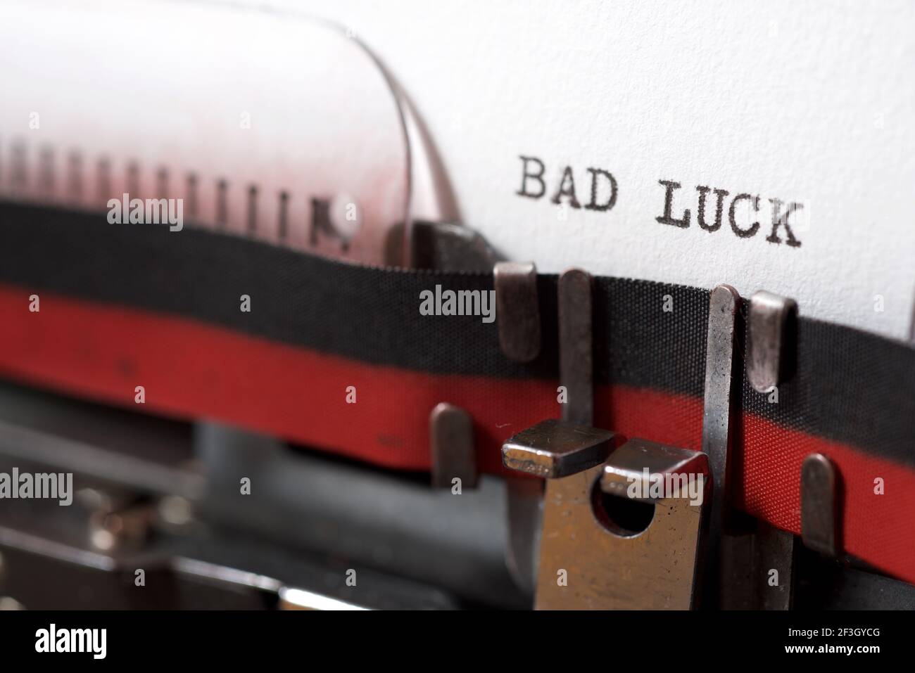 Bad luck phrase written with a typewriter Stock Photo - Alamy