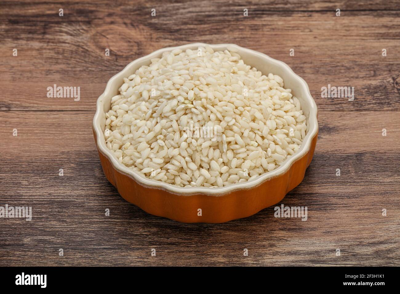 Raw Italian arborio rice for Risotto Stock Photo - Alamy