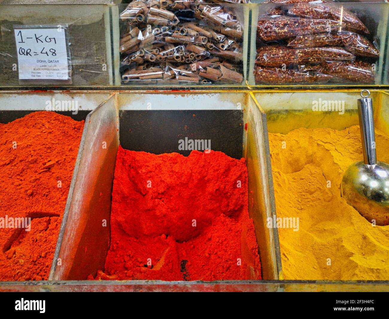 Wide variety of typical Indian and Arabic spices, displayed in a street ...