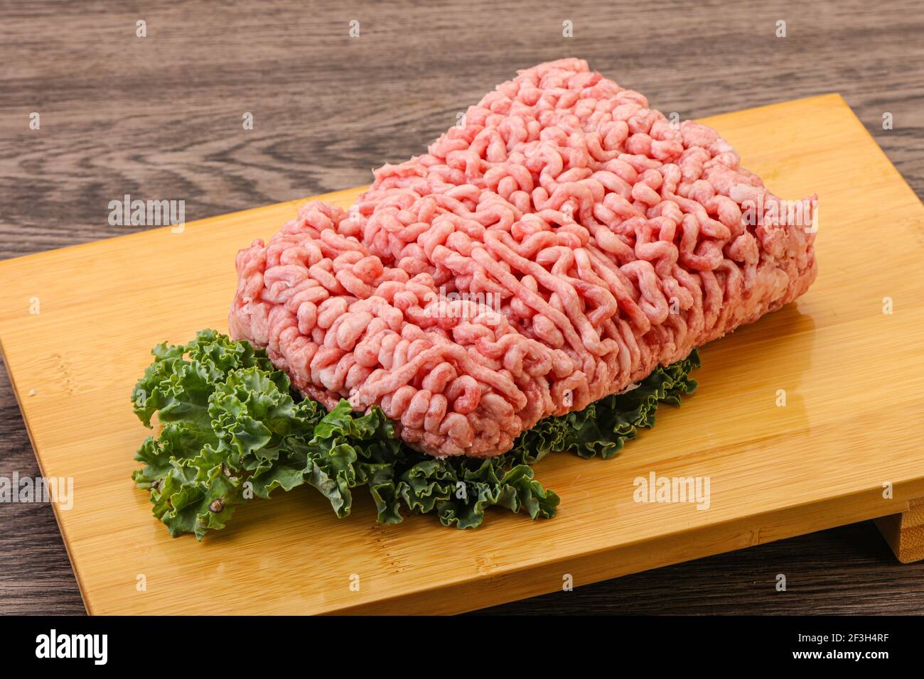 Raw pork minced meat with spices for cooking Stock Photo - Alamy