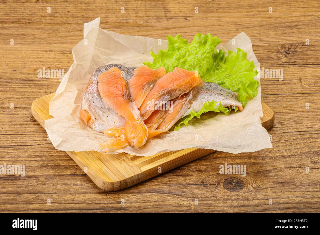 Sliced natural wild trout fillet over board Stock Photo - Alamy