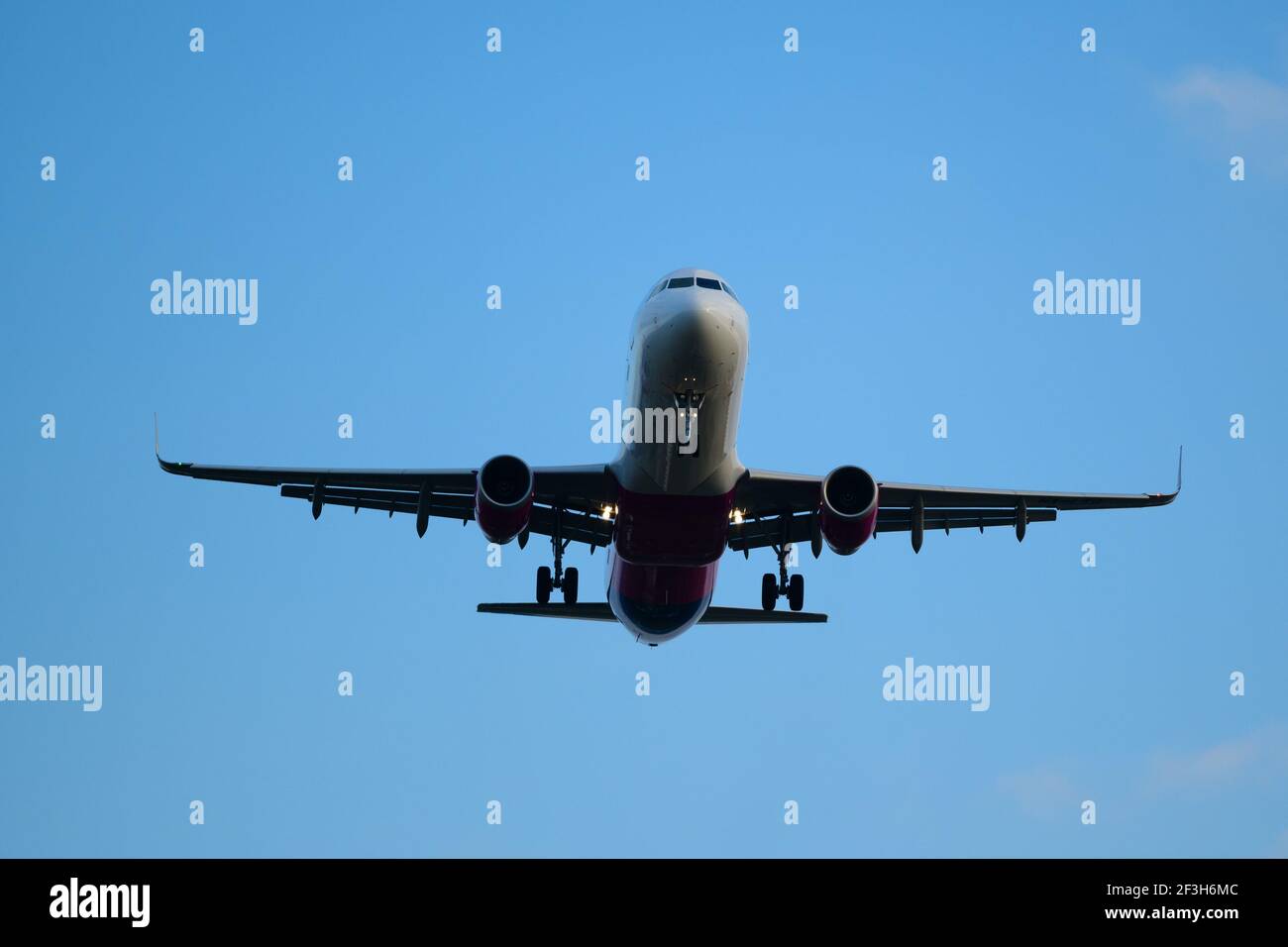 two engine aircraft landing at the airport of vienna, austria Stock ...