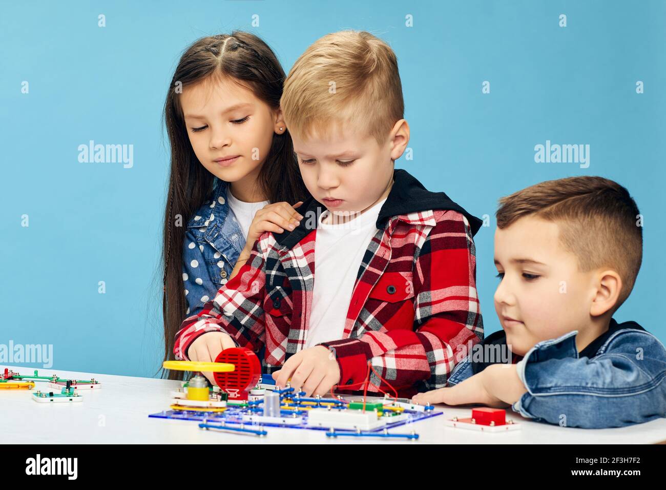 children playing with electronic constructor at studio Stock Photo - Alamy