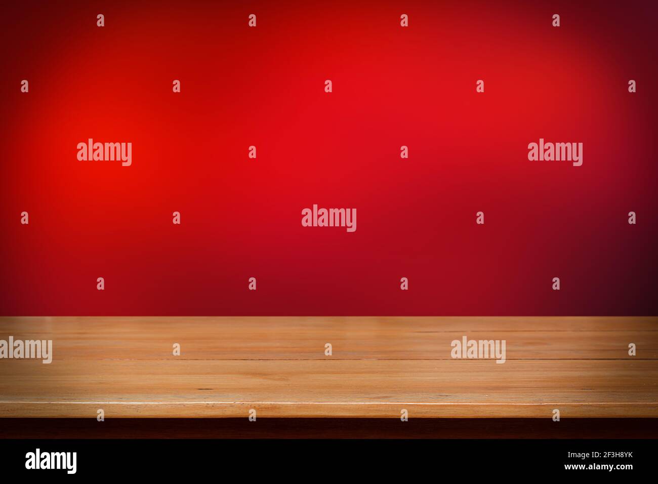 Wood table top on dark red abstract background Stock Photo - Alamy