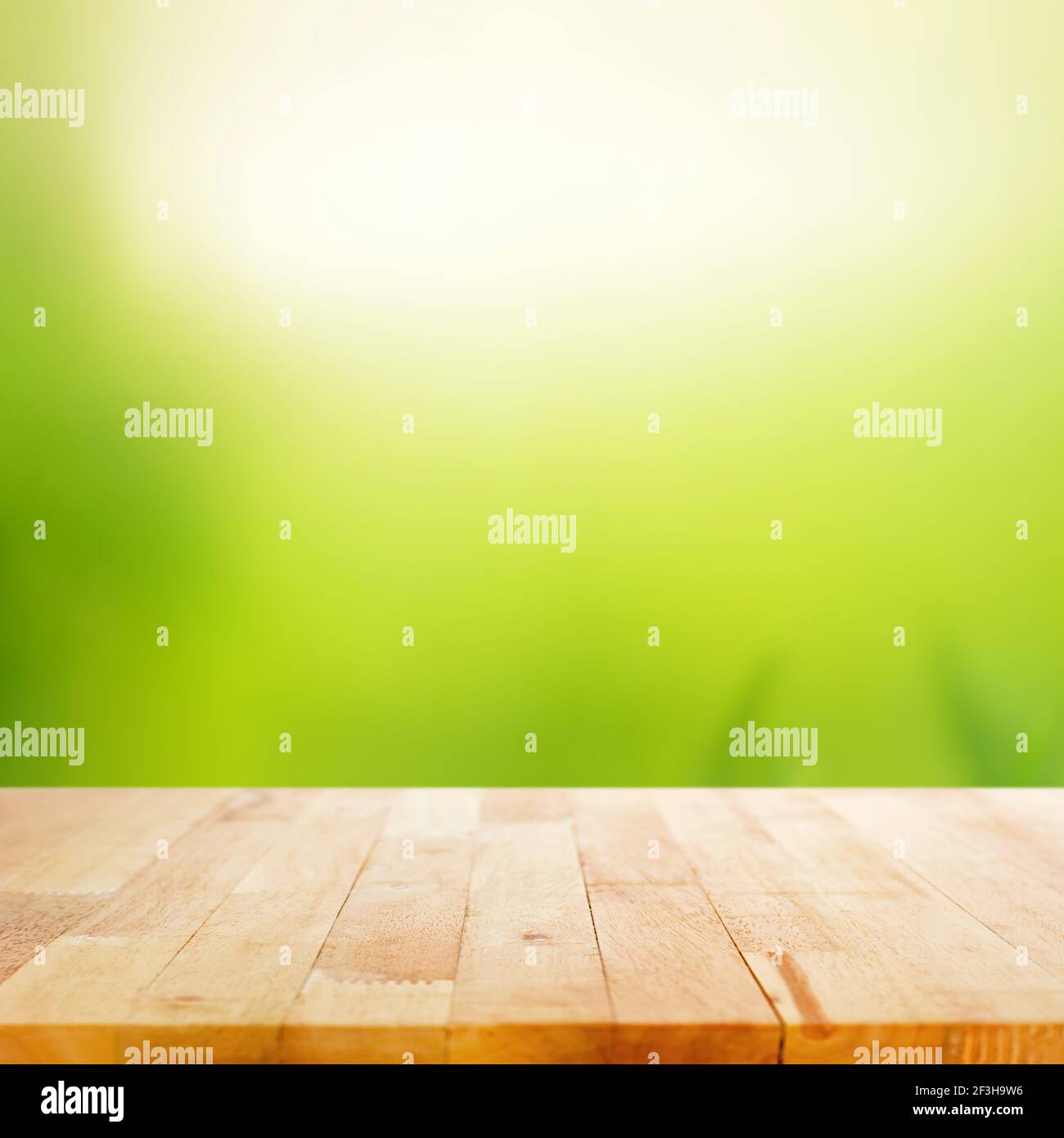 Wood table top on white green abstract background Stock Photo - Alamy