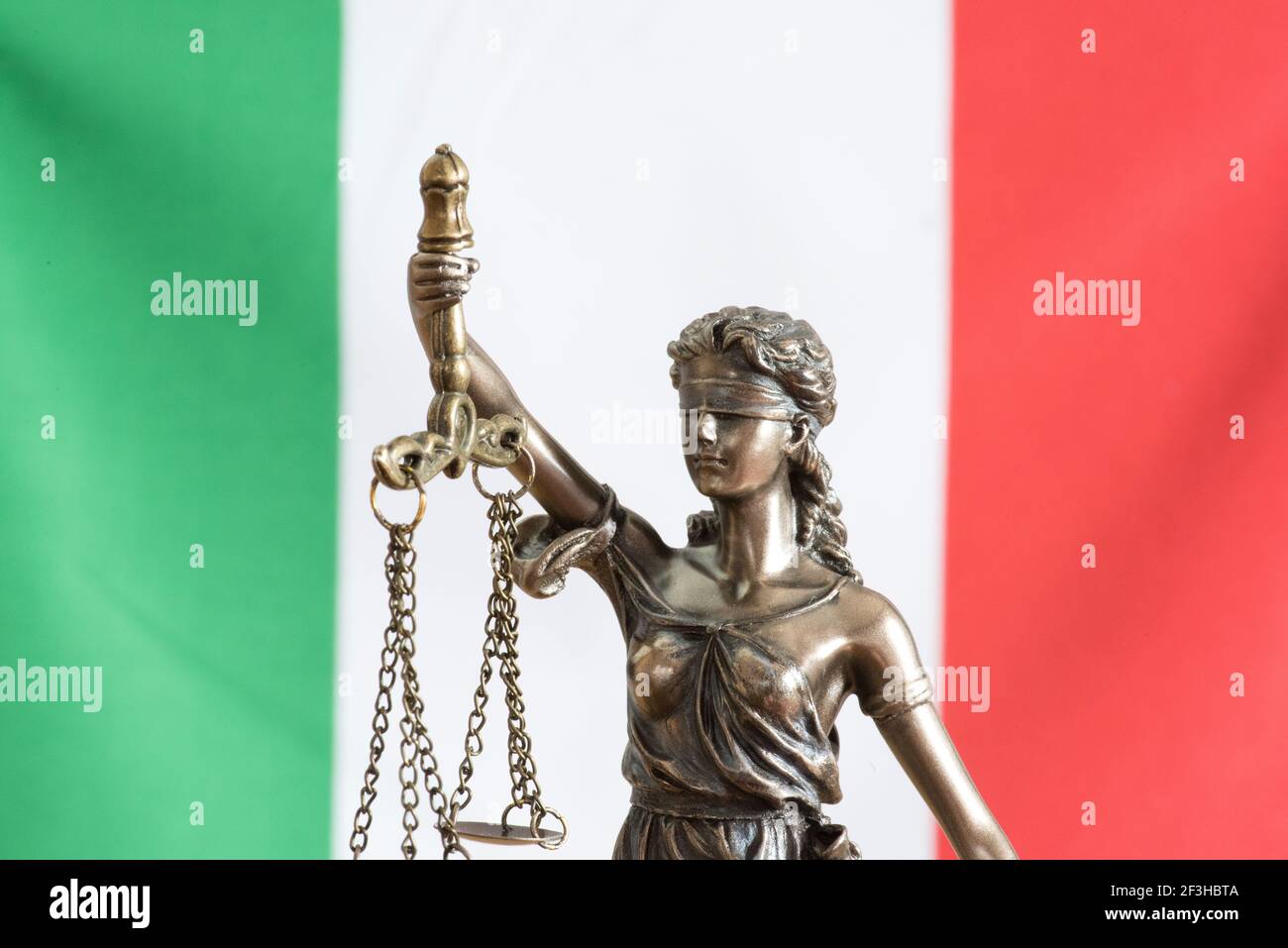 Flag of Italy and Lady Justice statue Stock Photo - Alamy