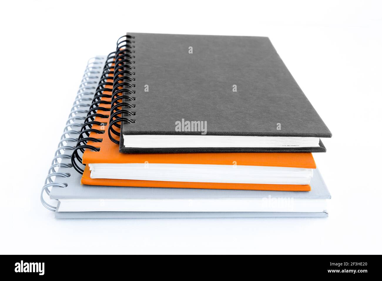 Stack of notebooks (or copybooks) isolated on white background Stock ...