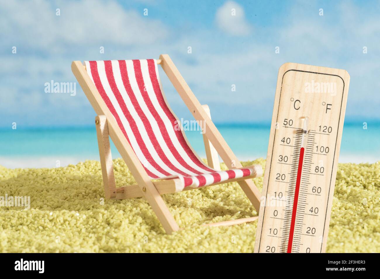Beach, sun lounger and thermometer in summer Stock Photo - Alamy