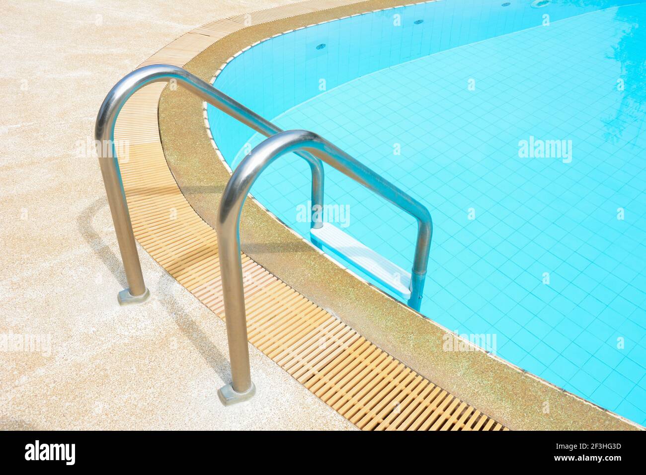 Swimming pool laddder Stock Photo - Alamy