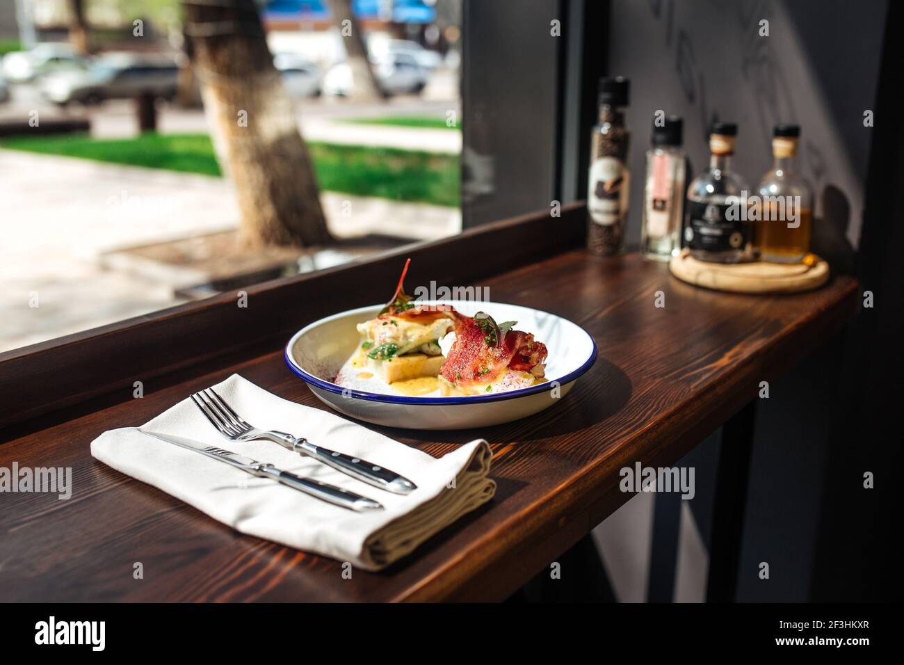 Morning breakfast on the cafe window desk Stock Photo - Alamy