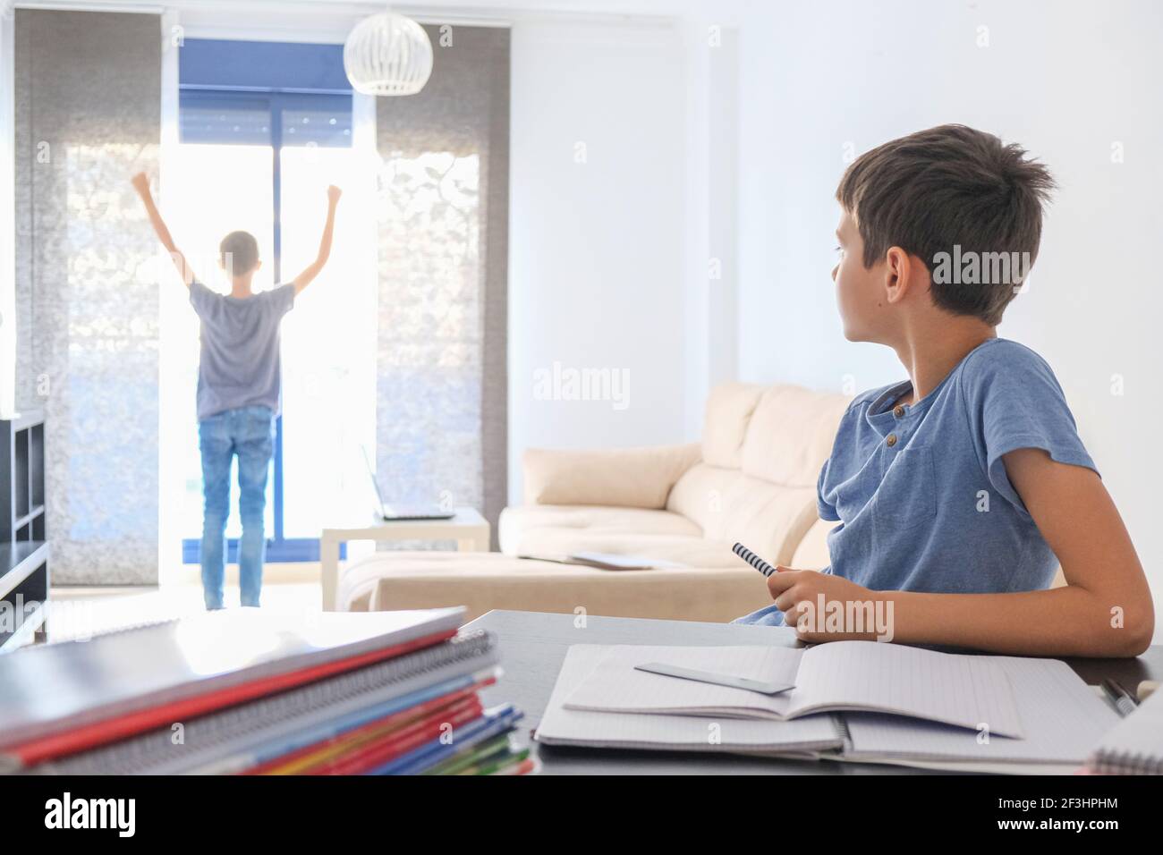 Children doing school homework at home. Online learning, distance ...