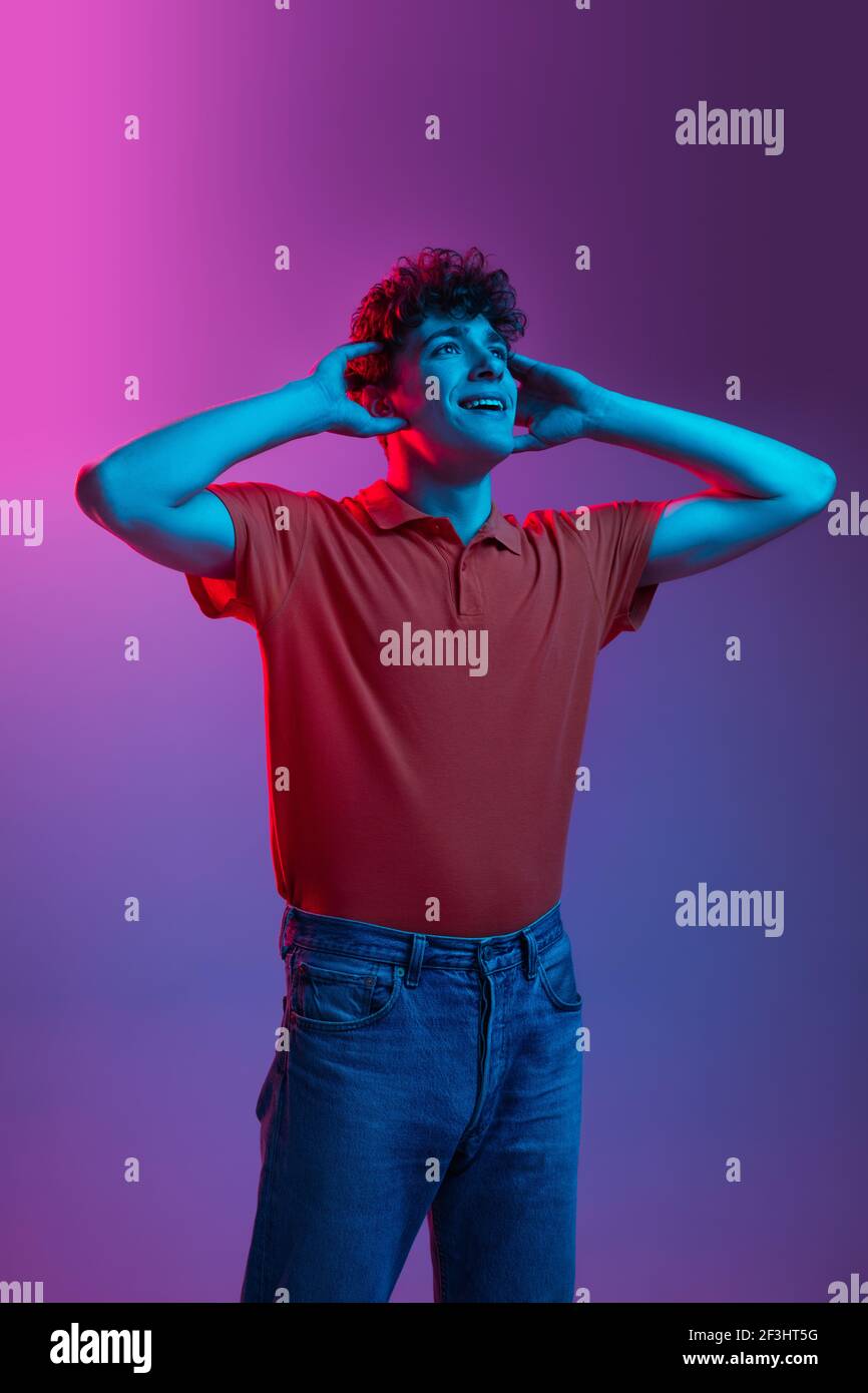 Happy joyful man in casual clothes isolated on gradient background in ...