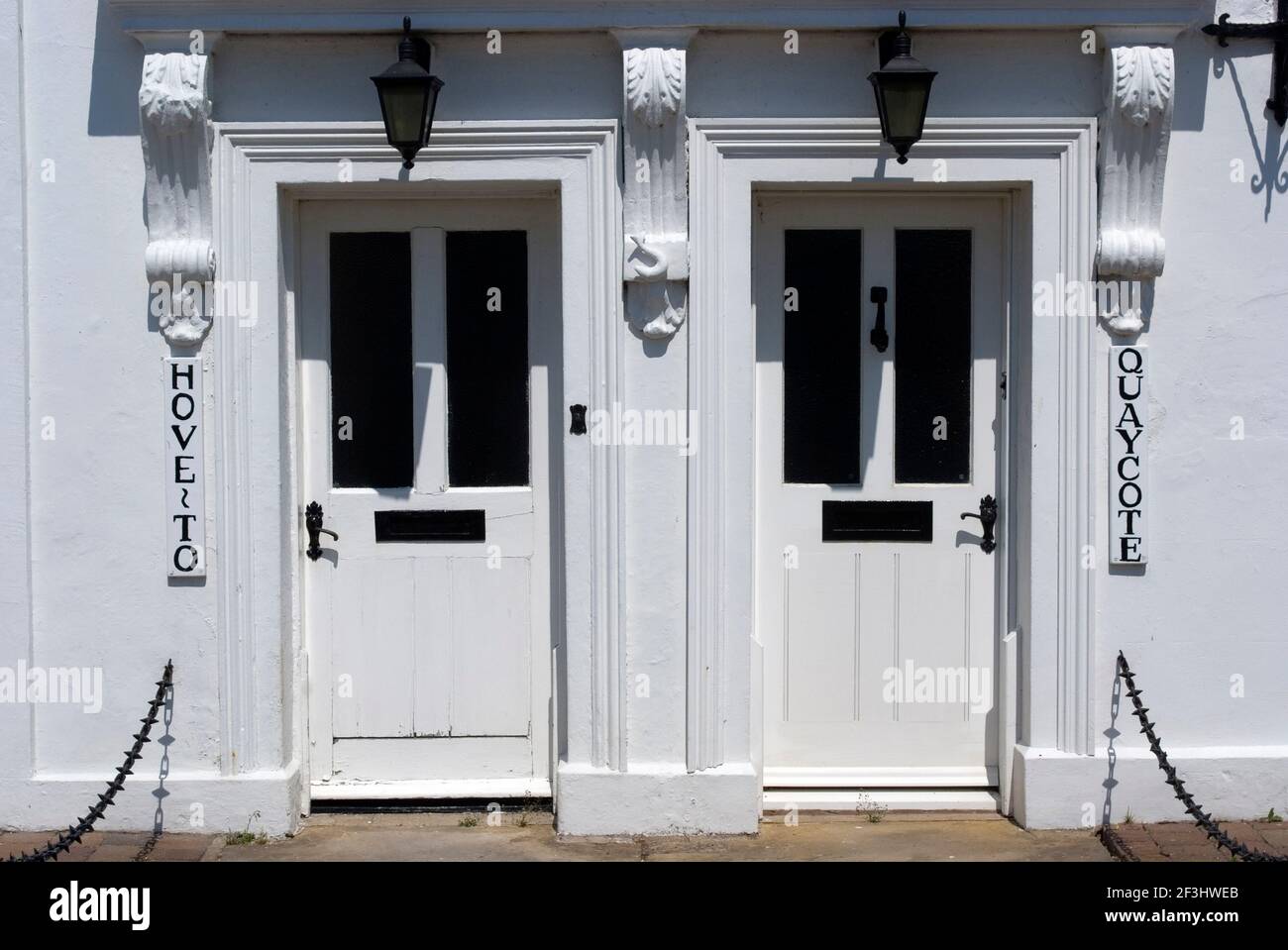 Twin white doors on the riverfront, Burnham-on-Crouch, Essex, England ...