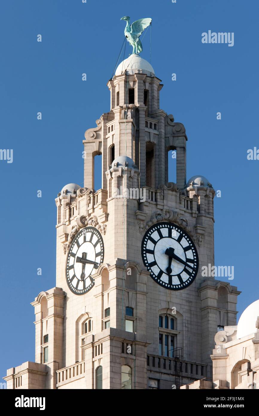 The clock tower on top of the Liver Building at Pier Head in Liverpool ...