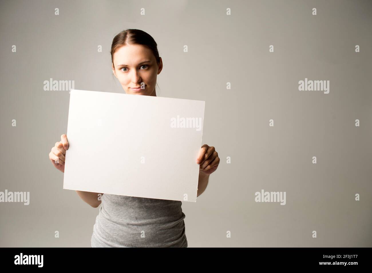 Young woman paper smile hi-res stock photography and images - Alamy