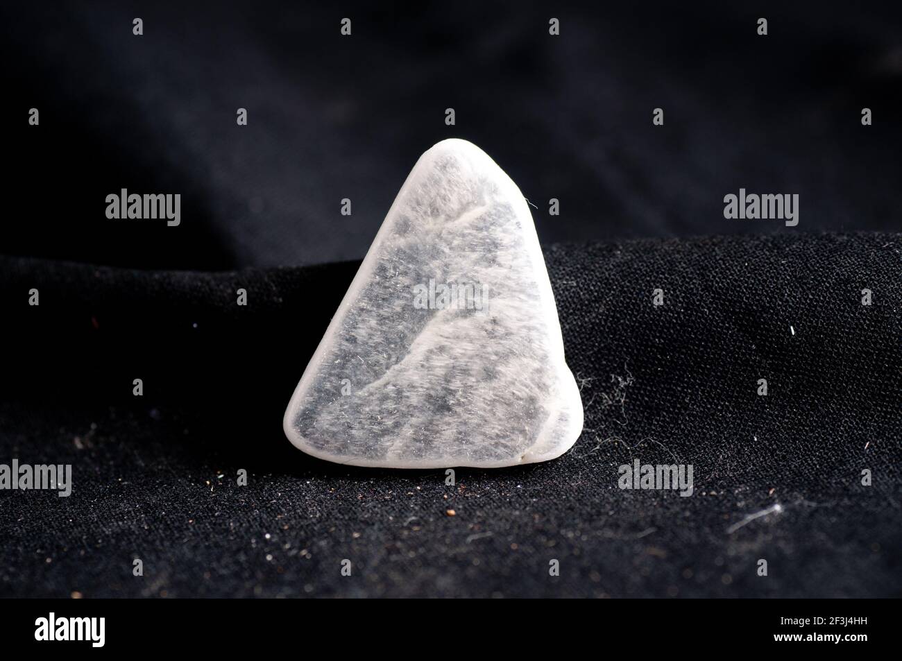 ulextite or tv rock mineral sample, white translucent stone Stock Photo ...