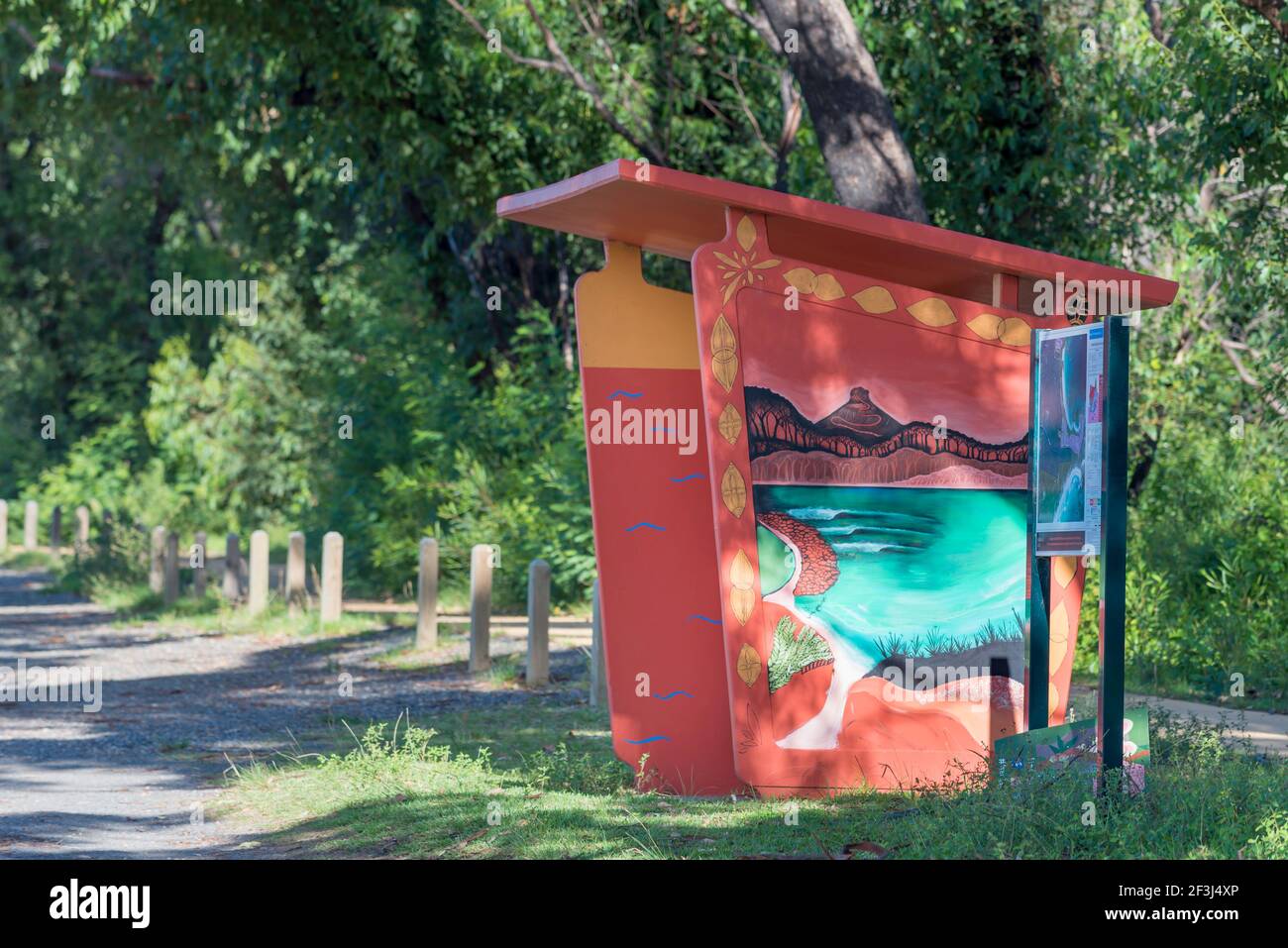 A multicoloured and painted mural covered bus shelter, bus stop or bus ...