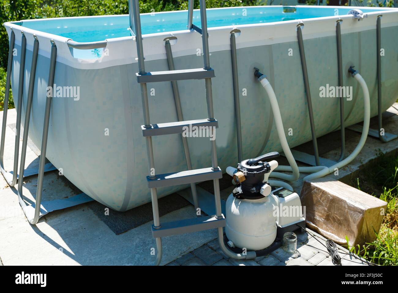 frame pool in the garden of a private house, summer Stock Photo - Alamy