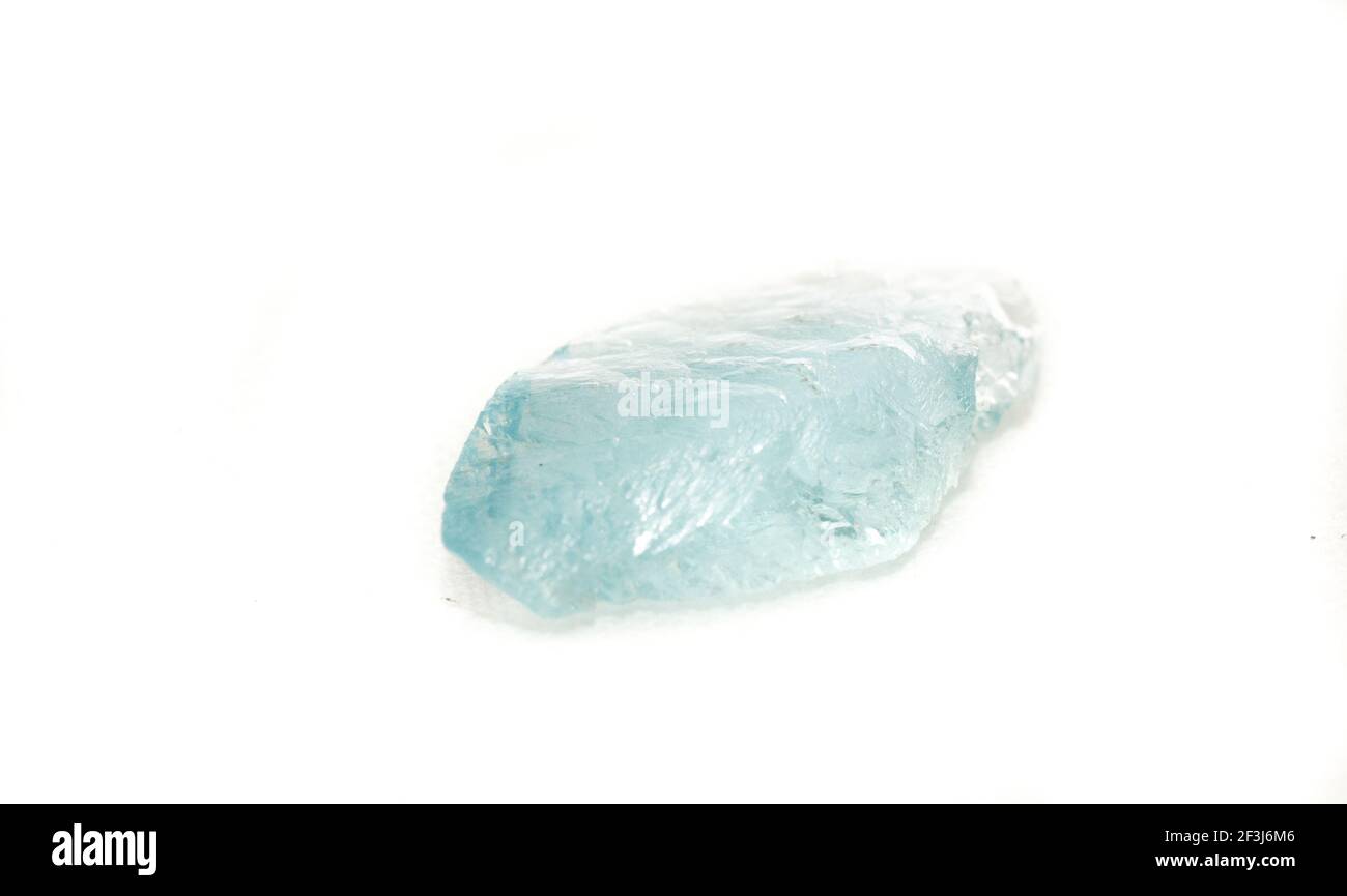 light blue beryl jewel cut crystal on a white background Stock Photo ...