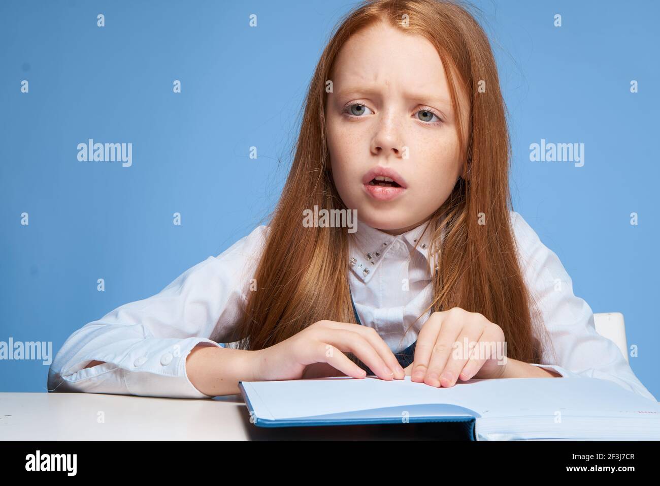 Red haired schoolgirl at school hi-res stock photography and images - Alamy