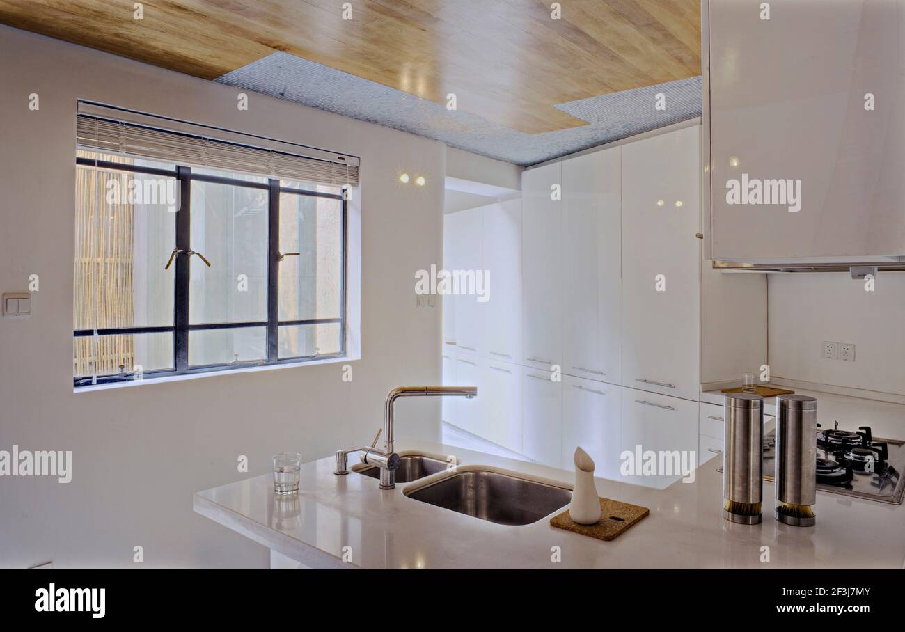 Conversion of a double-bayed 1930s lane house in Nanhui Road, Shanghai ...