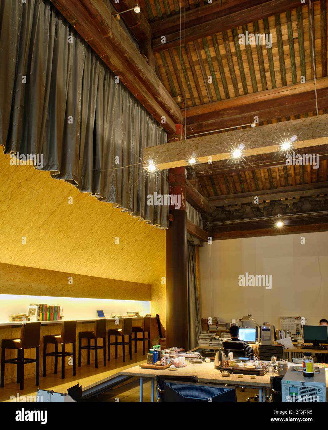 Artist and designer Zhong Song's office in the main hall of the Bai Lin ...