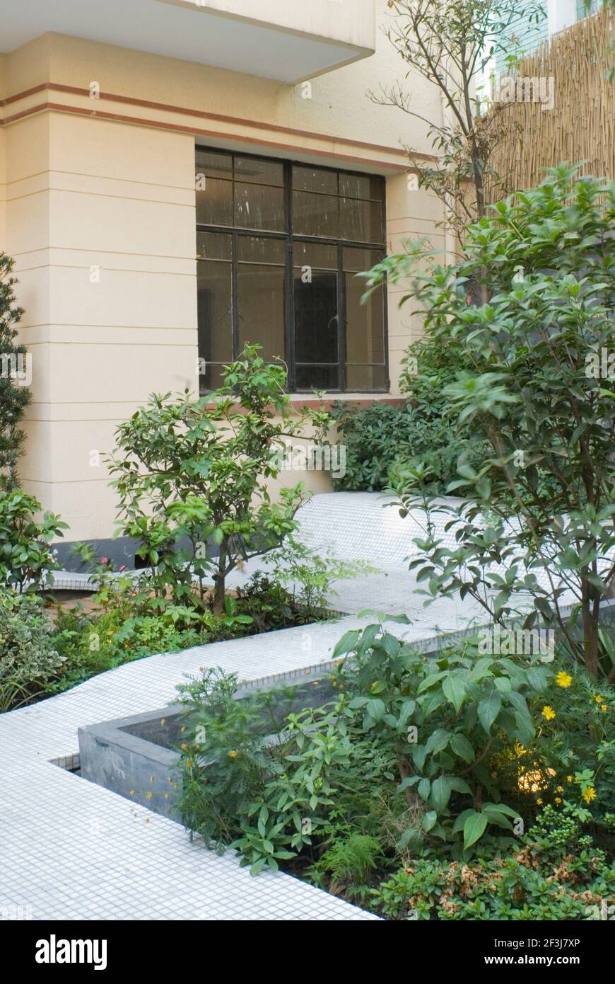 Conversion of a double-bayed 1930s lane house in Nanhui Road, Shanghai ...