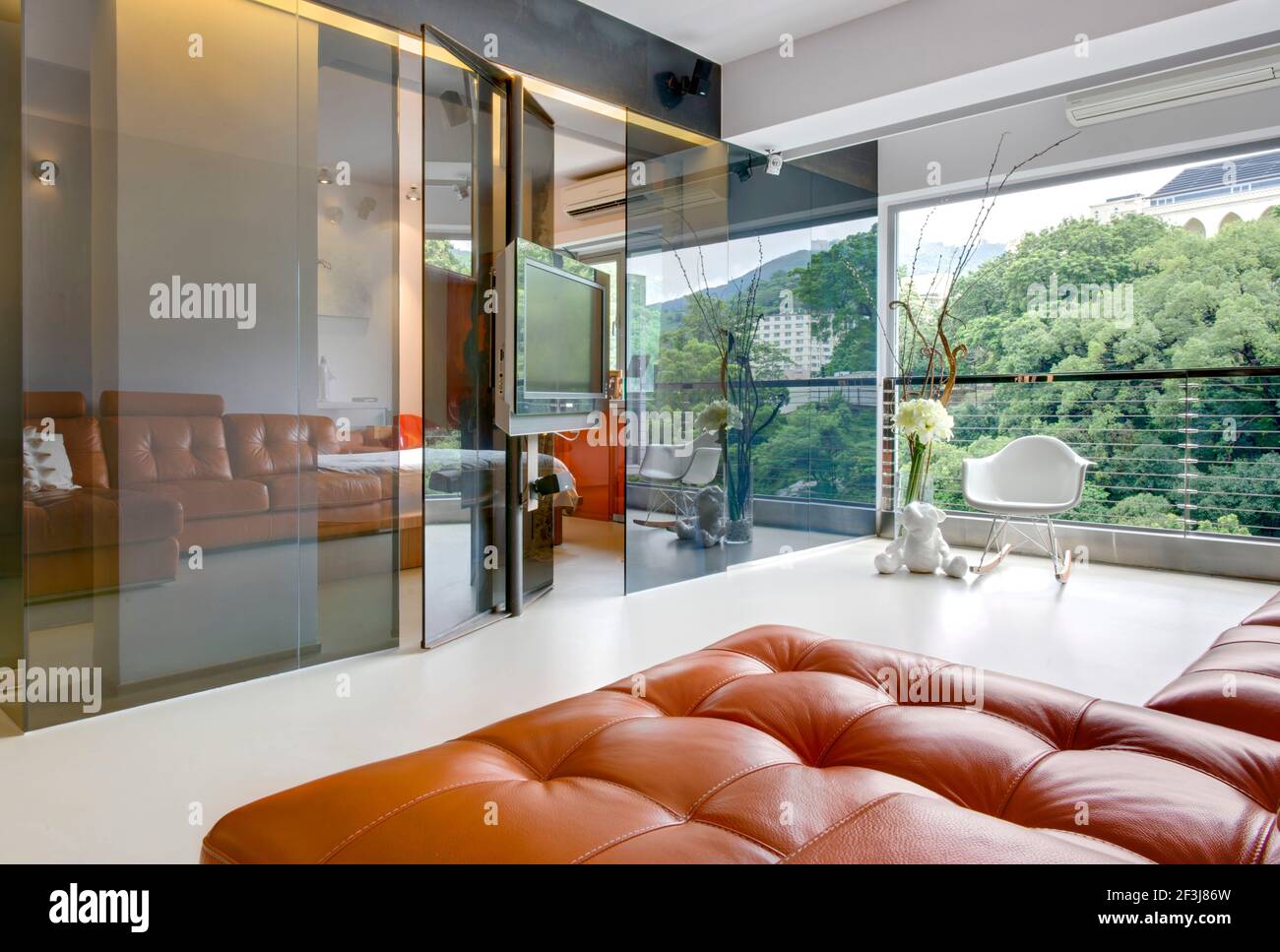 Bernard Chang apartment, Hong Kong, featuring rotating glass walls ...